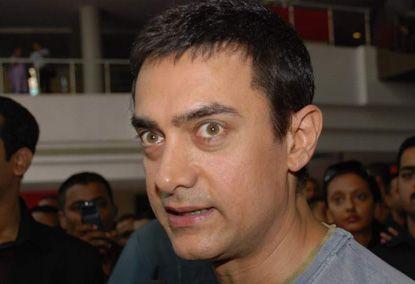 Ghajini hairstyle competition - Masala.com