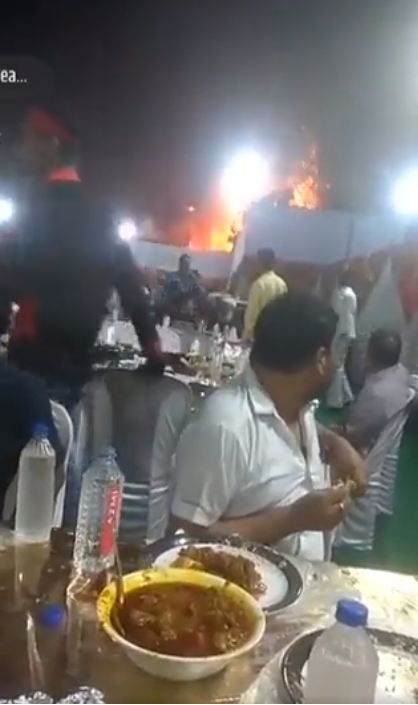 WATCH: Unfazed by wedding venue going up in flames, guests continue ...