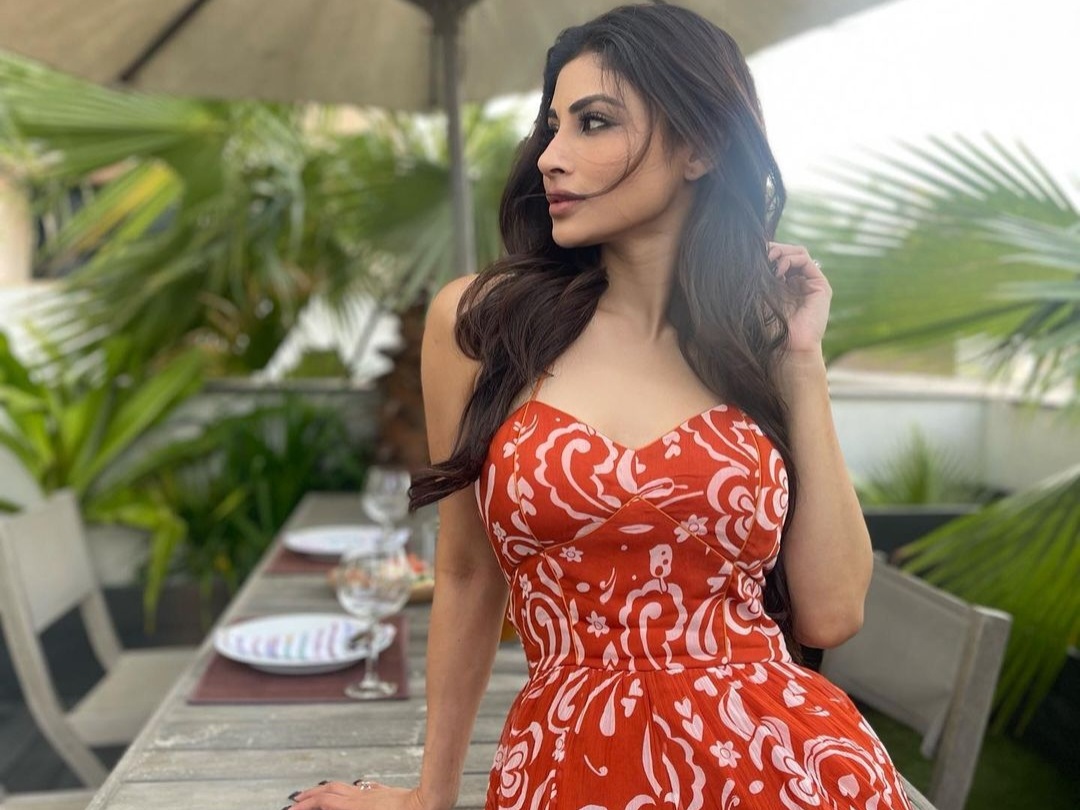 Mouni Roy flaunts her curvaceous figure in a summer dress