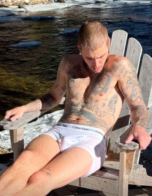 Justin Bieber’s ‘bulge’ & ‘winter pen*s’ steals the spotlight as he lounges in a tight white ...