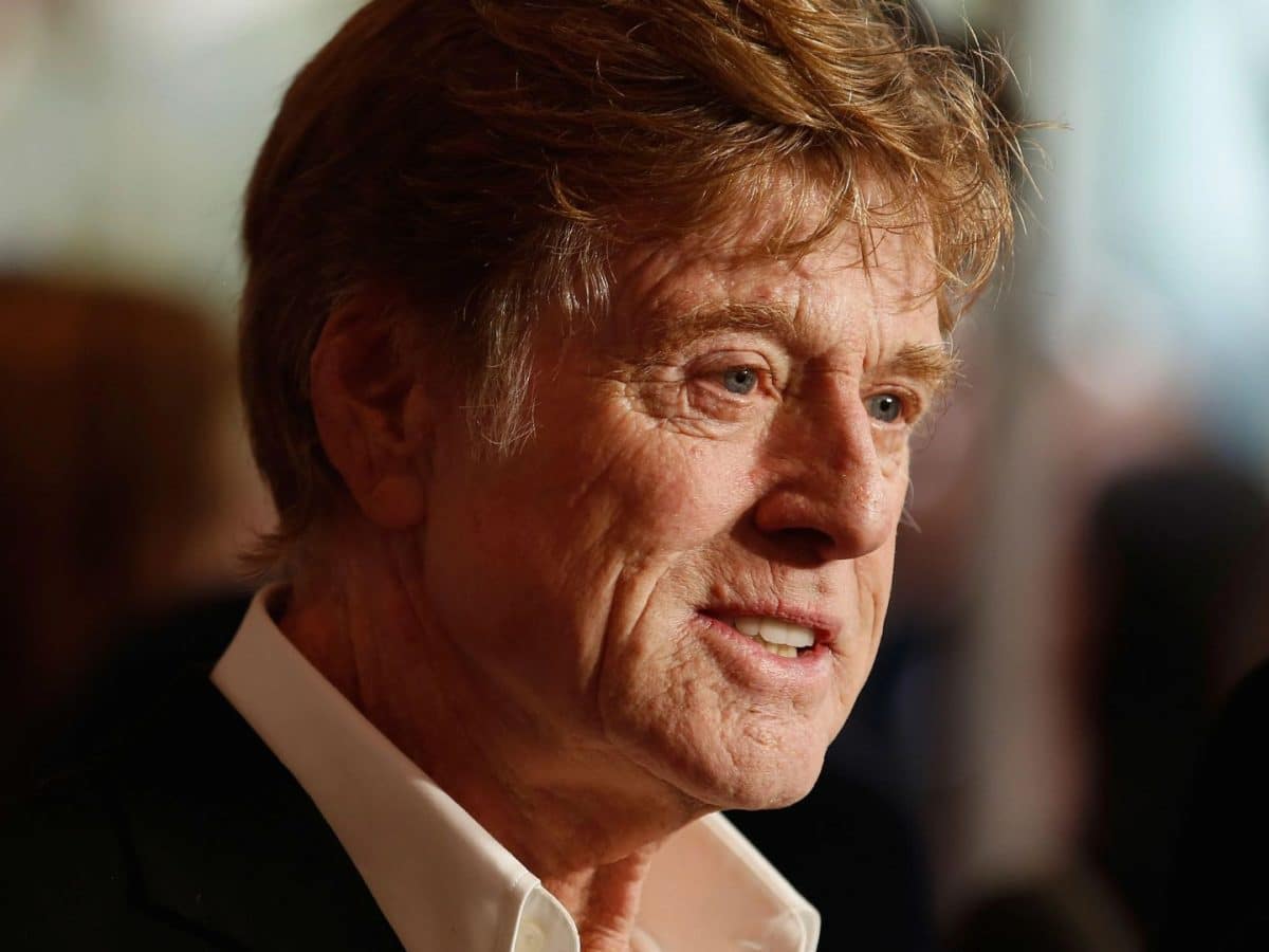 How is a drug-related murder connected to Robert Redford?