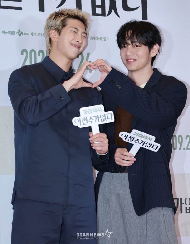 BTS members RM and V look stylish at the VIP premire of Park Chan Wook ...